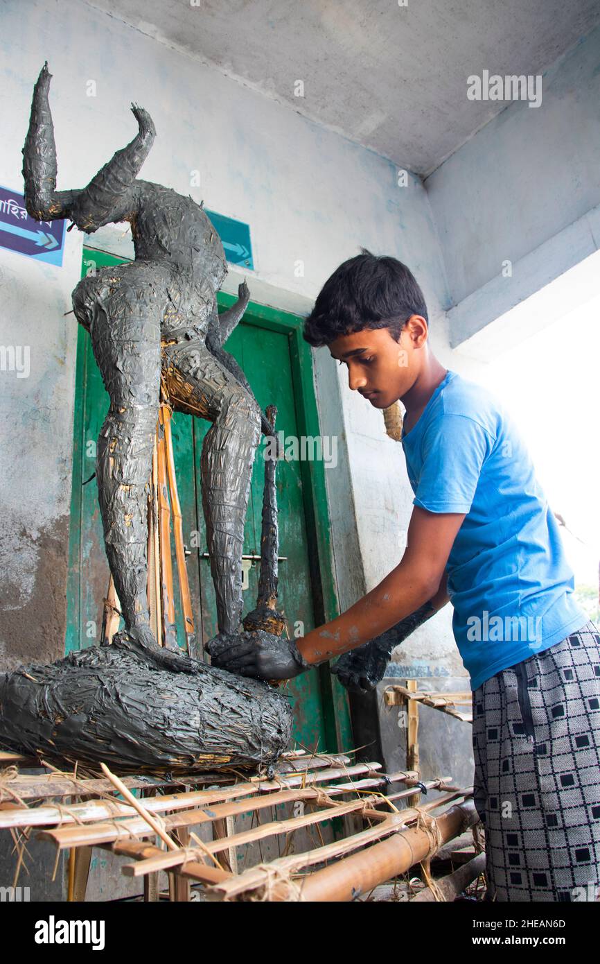 Indian Boy Making Idol Goddess Stock Photo - Alamy