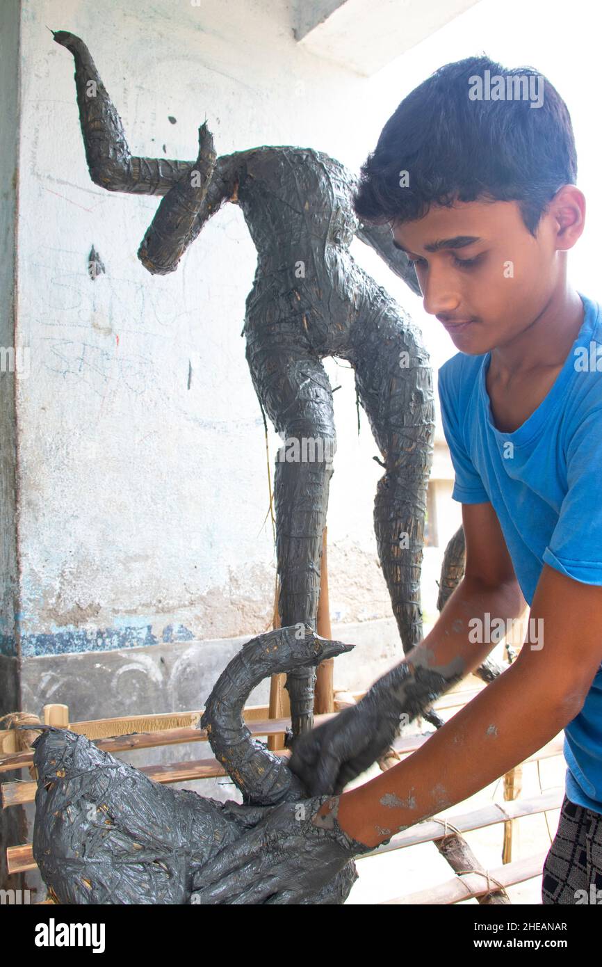 Indian Boy Making Idol Goddess Stock Photo - Alamy