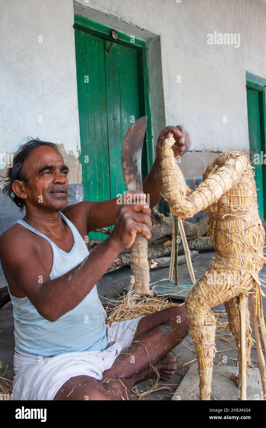 An artist prepares an idol of Goddess Stock Photo - Alamy
