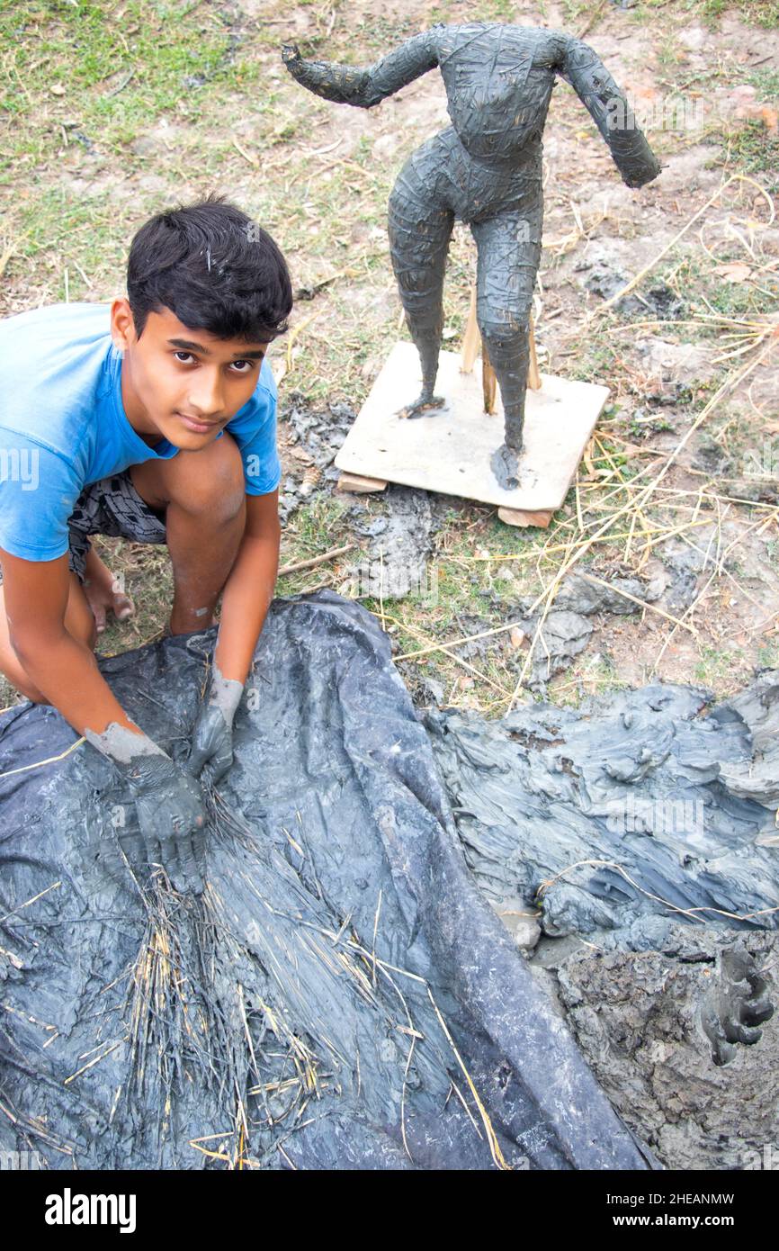 Indian Boy Making Idol Goddess Stock Photo - Alamy