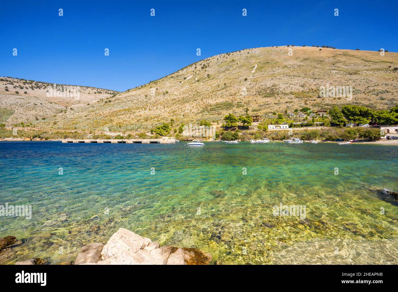 Azure bay in Porto Palermo near Himare in Albania Stock Photo - Alamy