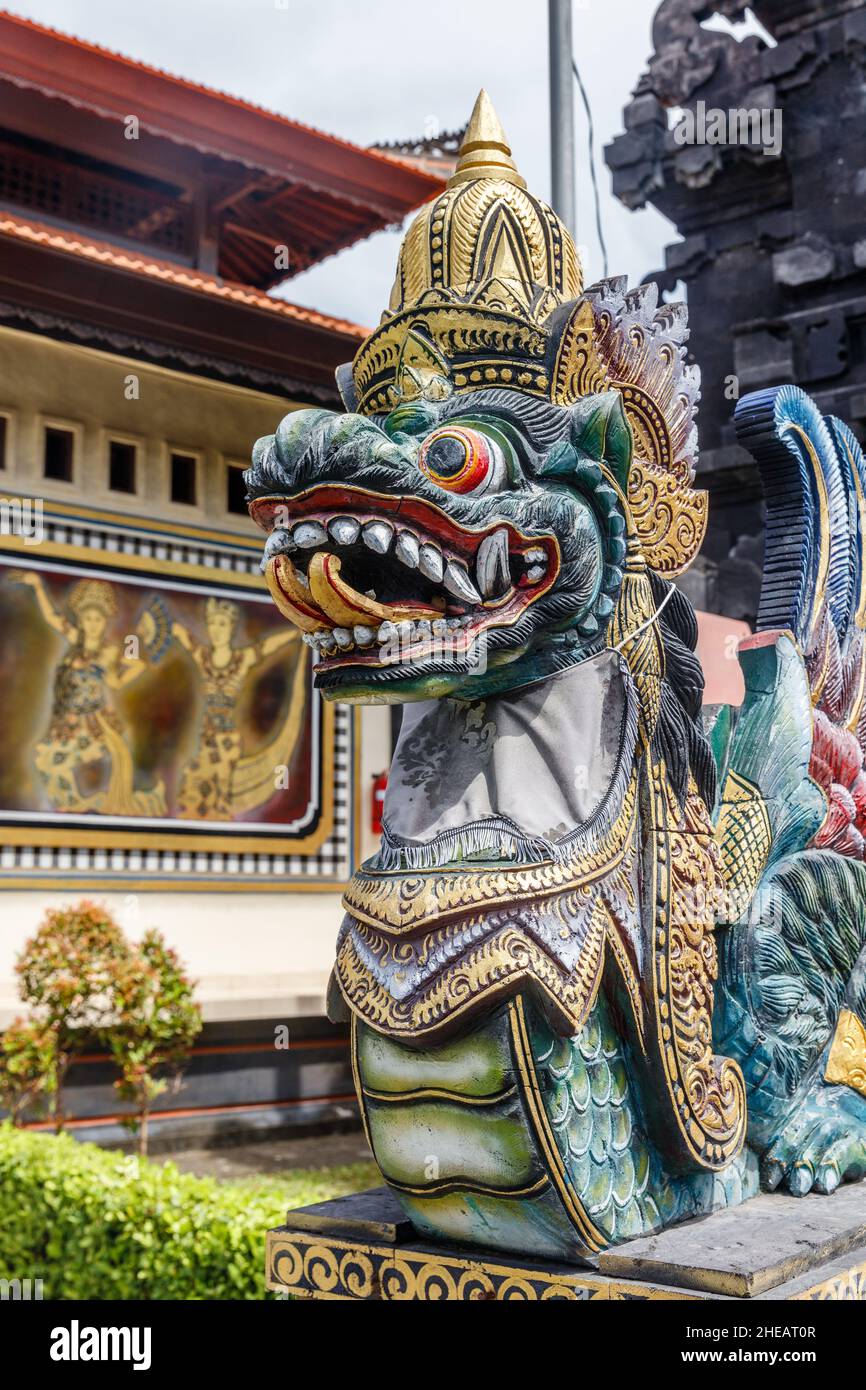 Dragon (naga) guardian statue at Balinese Hindu sea temple (Pura Segara ...