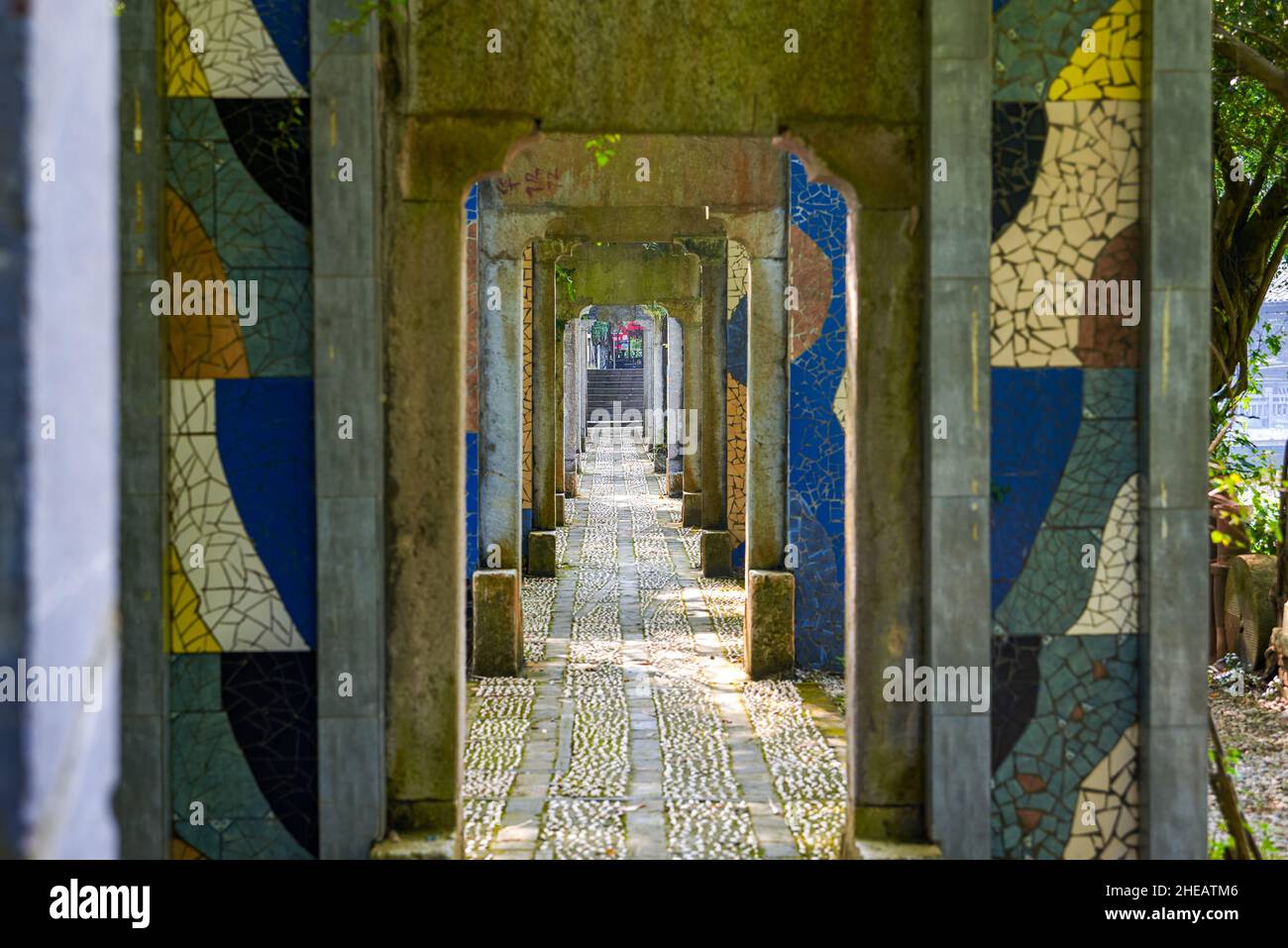 Colorful tile gates and walking paths in the park Stock Photo - Alamy
