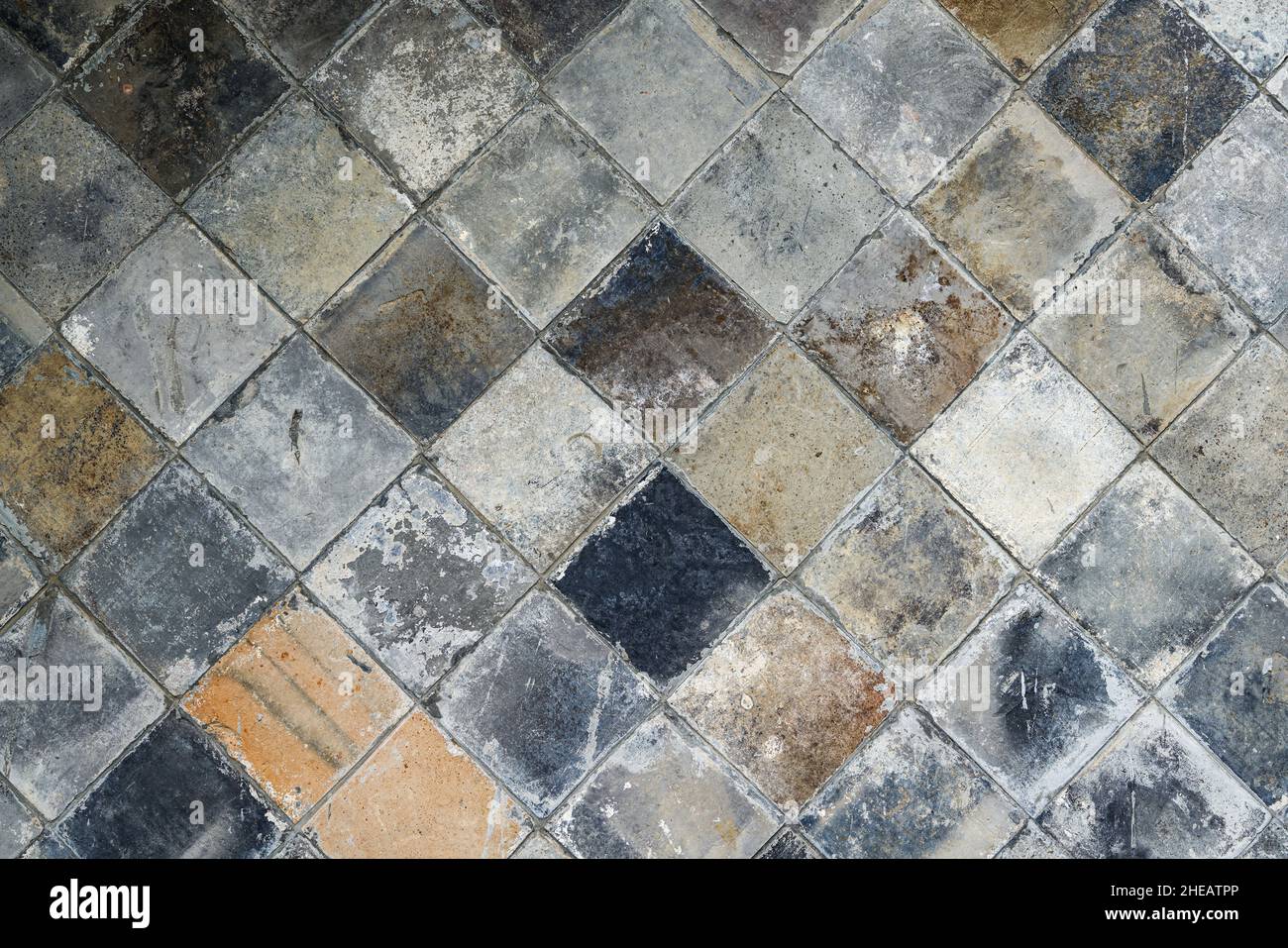 A background wall made of square bricks and tiles Stock Photo - Alamy