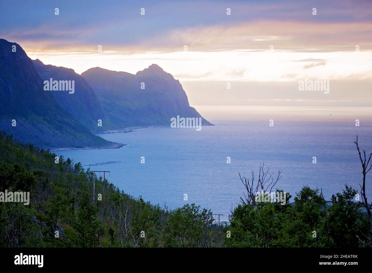 Aerial view of Husoy, little village on a tiny island belonging to the ...