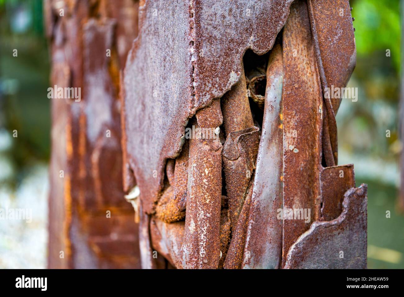 A pile of rusty water pipes and scrap iron twisted together Stock Photo ...