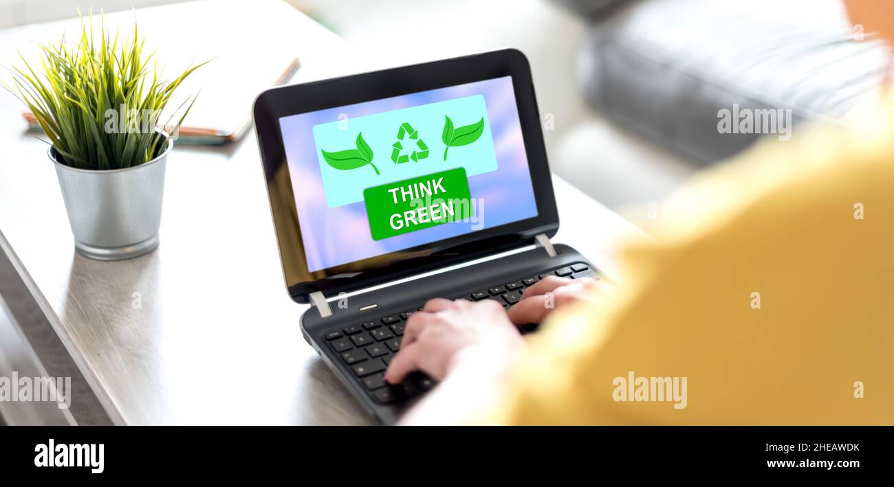 Laptop screen displaying a think green concept Stock Photo - Alamy