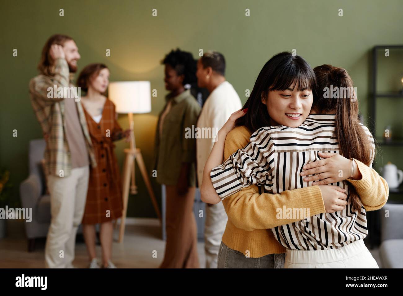 Women embracing hi-res stock photography and images - Alamy