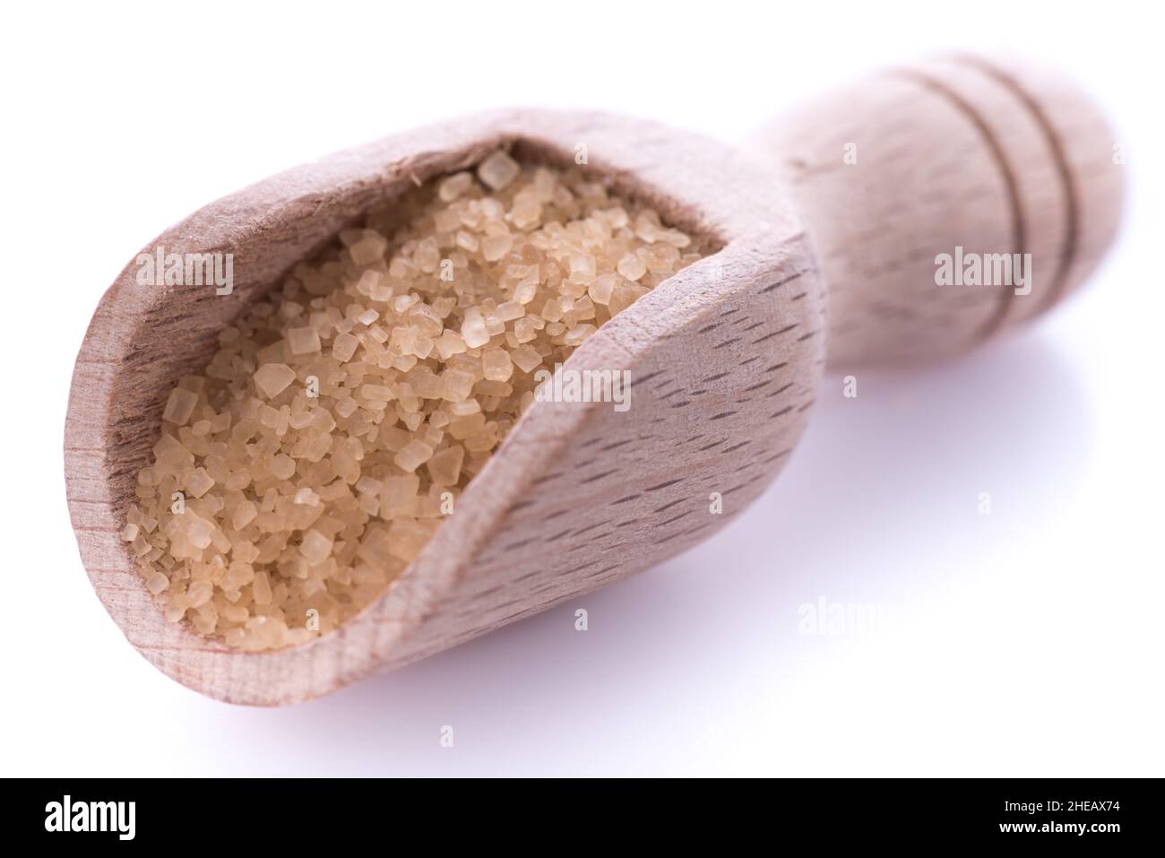 Brown sugar cane in a little wooden shovel, isolated on white Stock ...