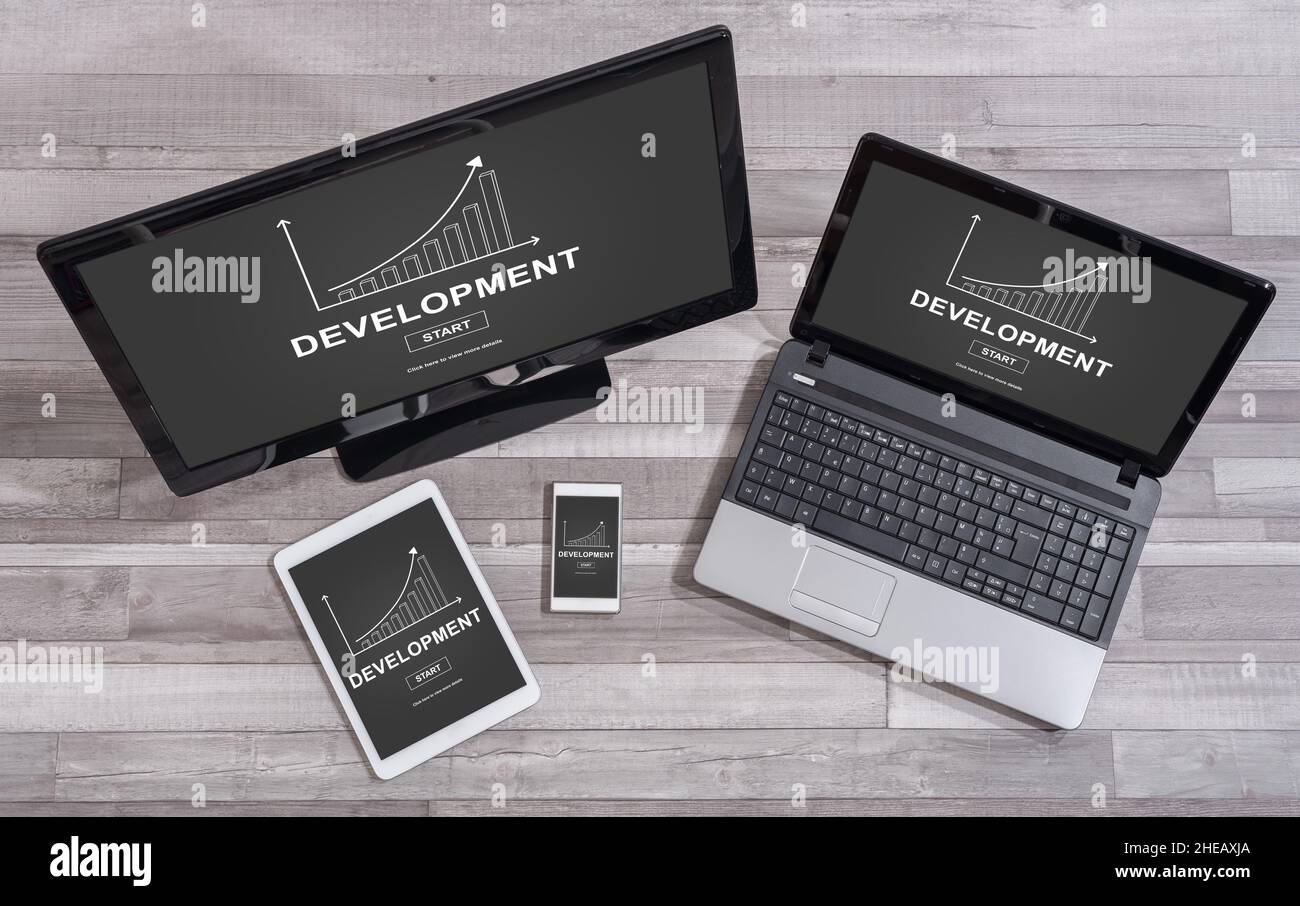 Business development concept shown on different information technology ...