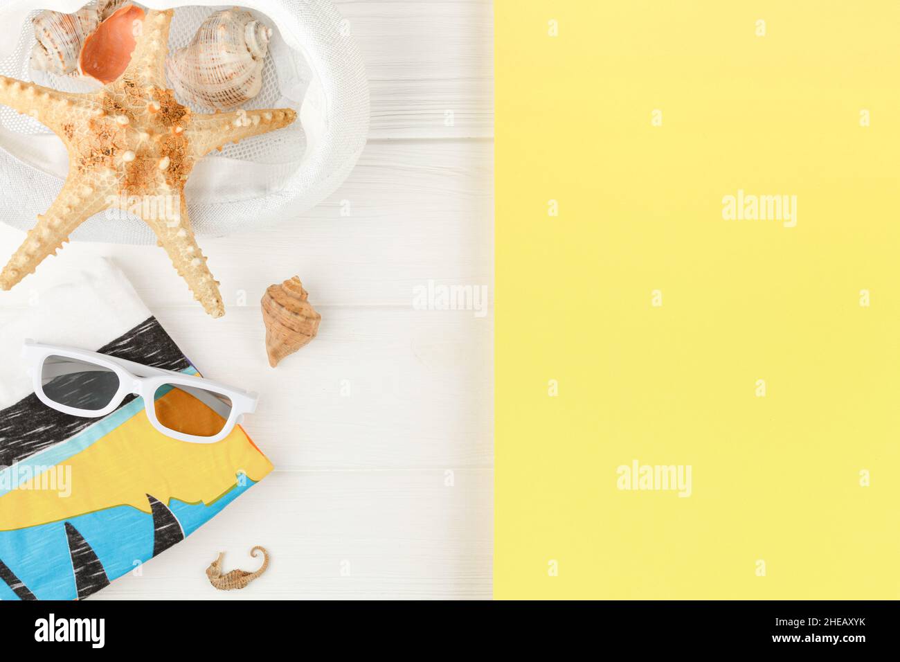 Beachwear and clam souvenirs banner Stock Photo - Alamy