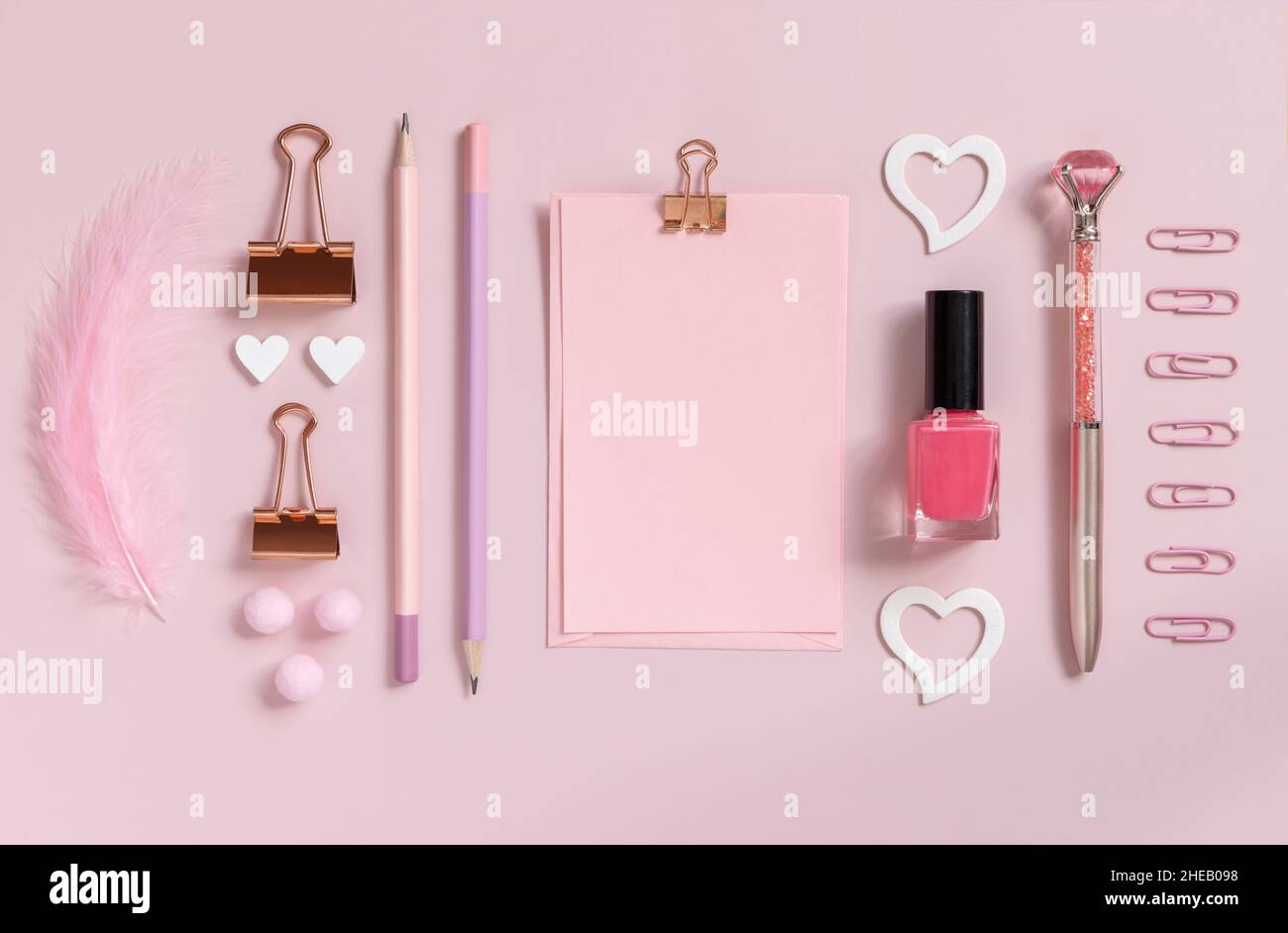 Pink paper card with clip, school girlish accessories and hearts on ...