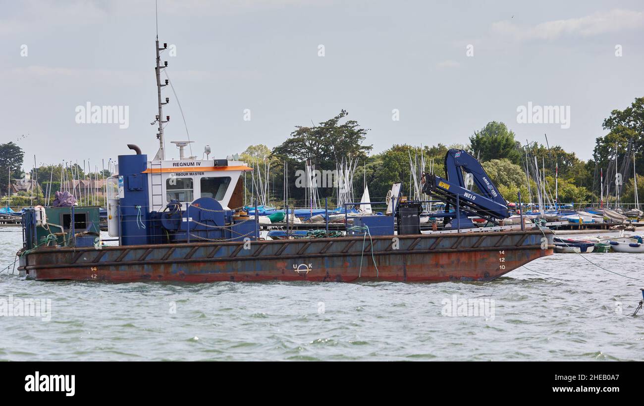 Working boat seen in the harbour of West Itchenor Stock Photo - Alamy