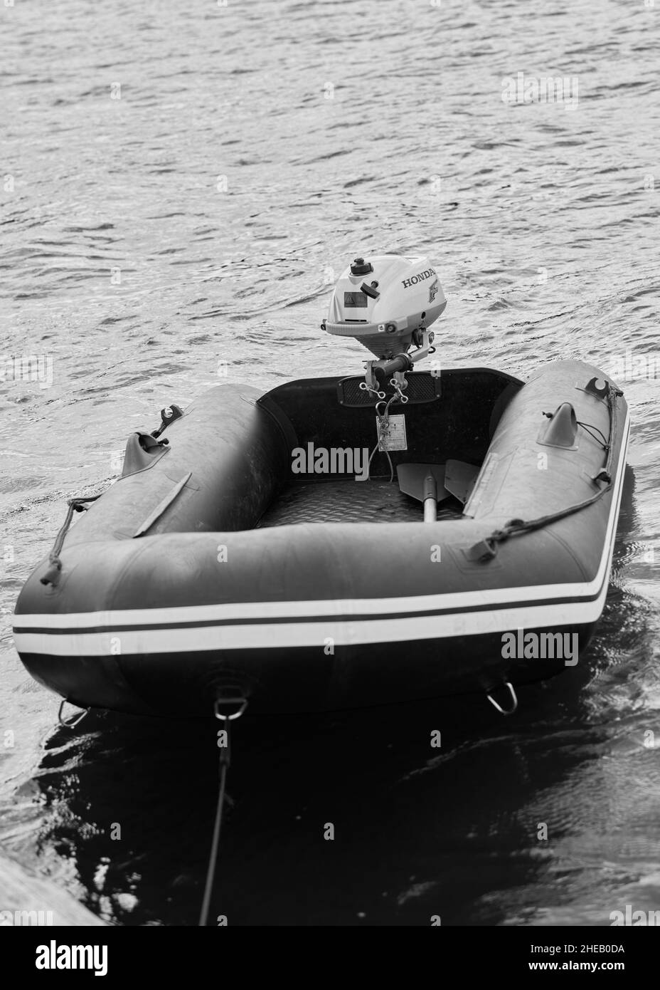 Logo of Honda on outdoor motor attached to a small boat Stock Photo - Alamy