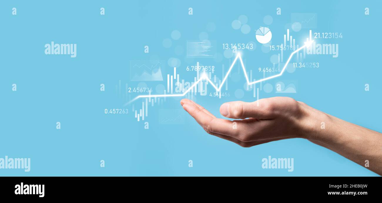 Businessman in hand hold banking business finance graph and invest in ...
