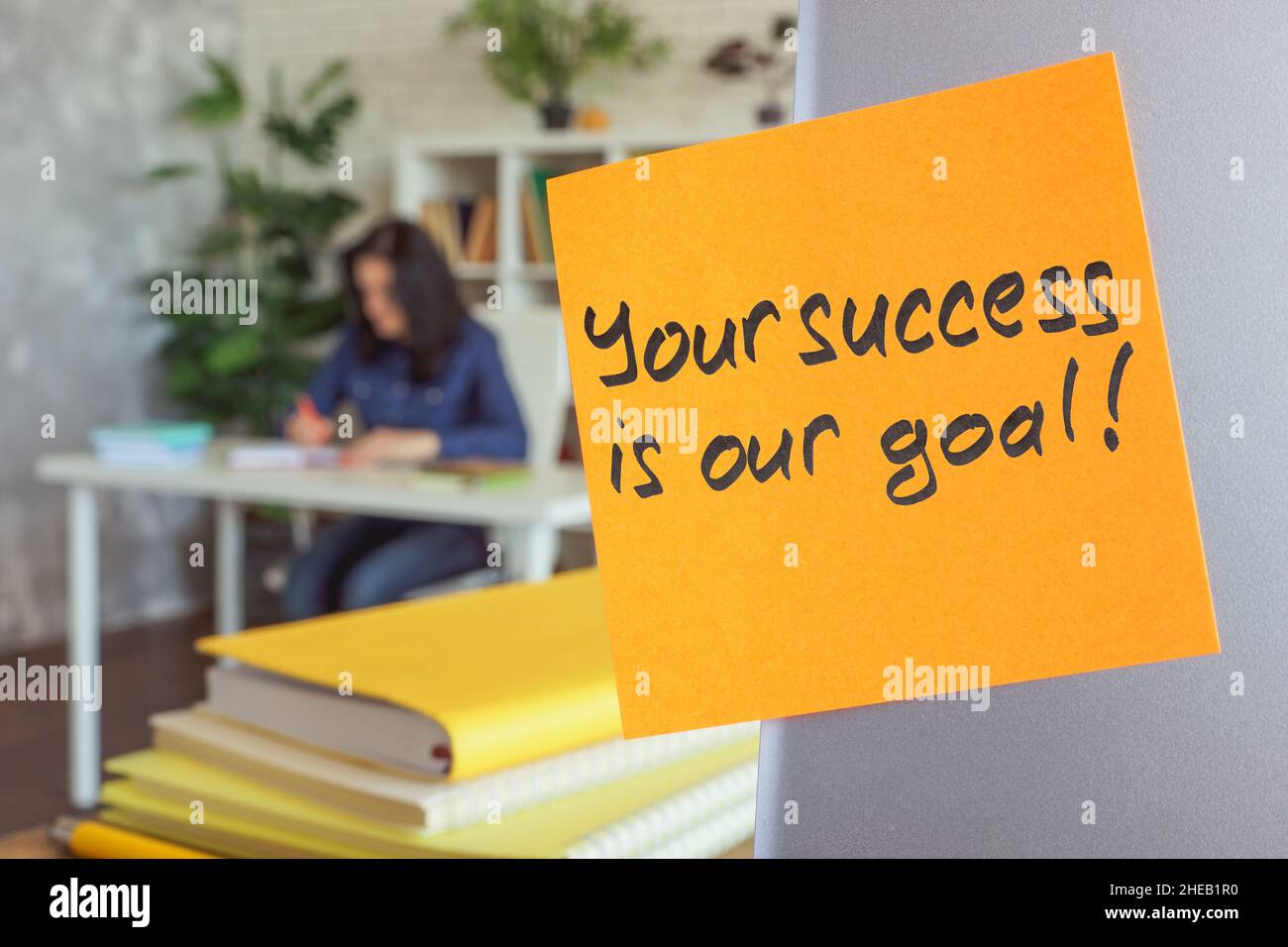Your success is our goal motivation quote on the sticker Stock Photo - Alamy