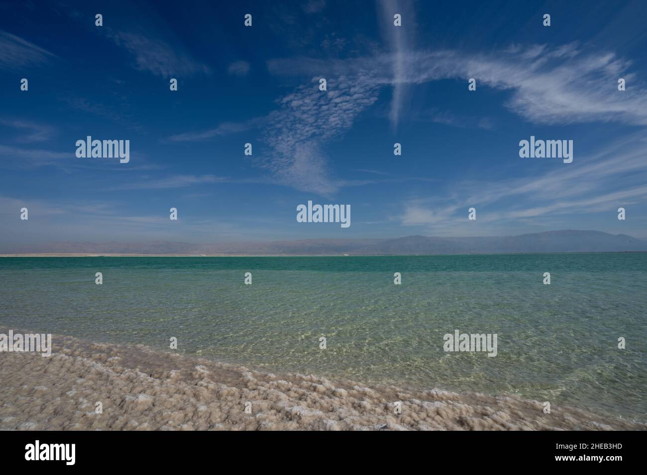 water level receding and salt crystallization due to evaporation on the ...