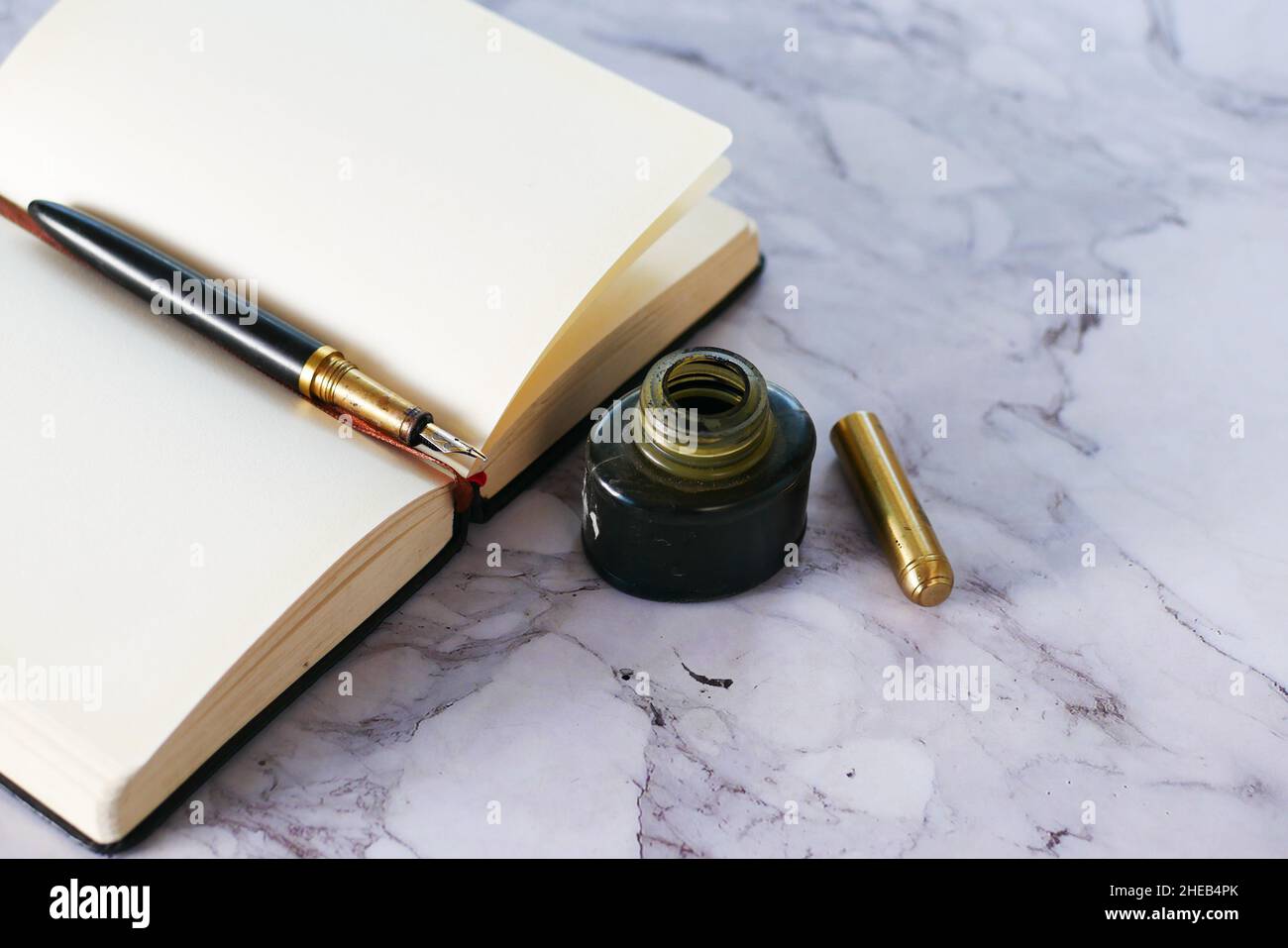 Old book and pen nib hi-res stock photography and images - Alamy