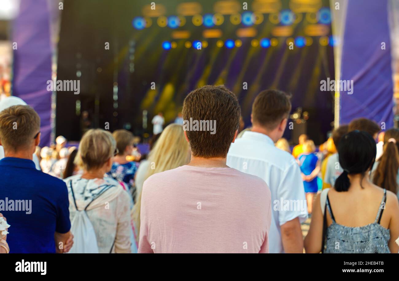 Large audience watching open air performance hi-res stock photography ...