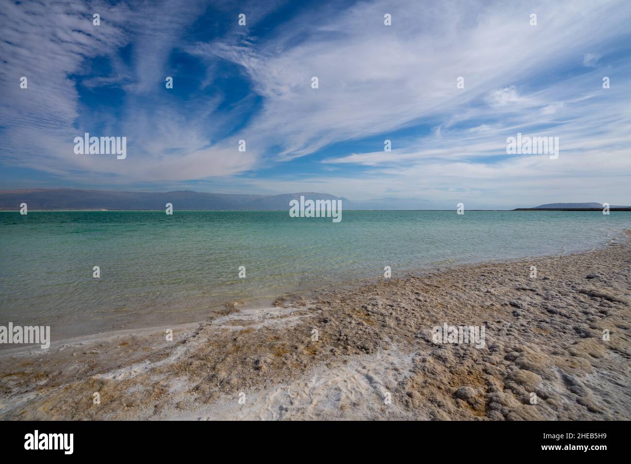 water level receding and salt crystallization due to evaporation on the ...