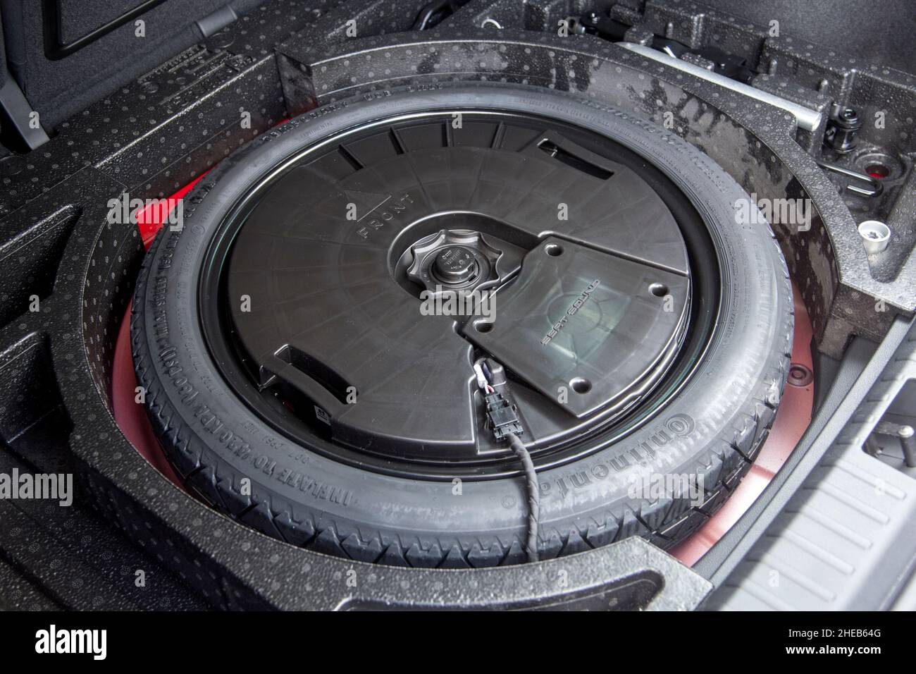 Sub woofer speaker in a spare wheel 2016 SEAT Ateca SUV family car ...