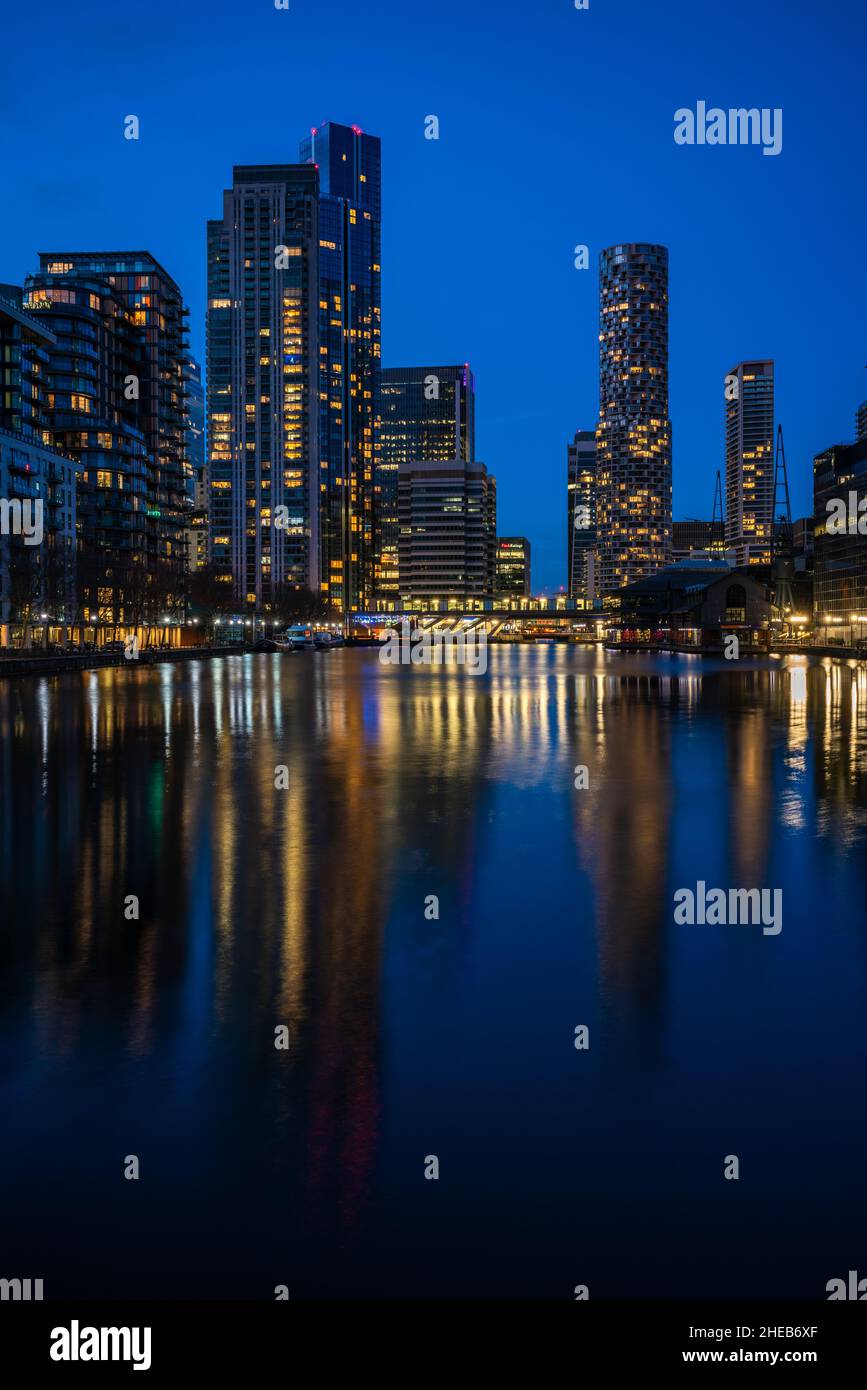Evening view of modern skyscrapers across Millwall Inner Dock in Canary ...