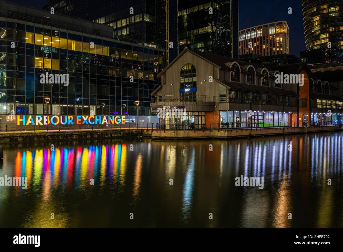 Night view of Harbour Exchange estate seem across Millwall Inner Dock ...