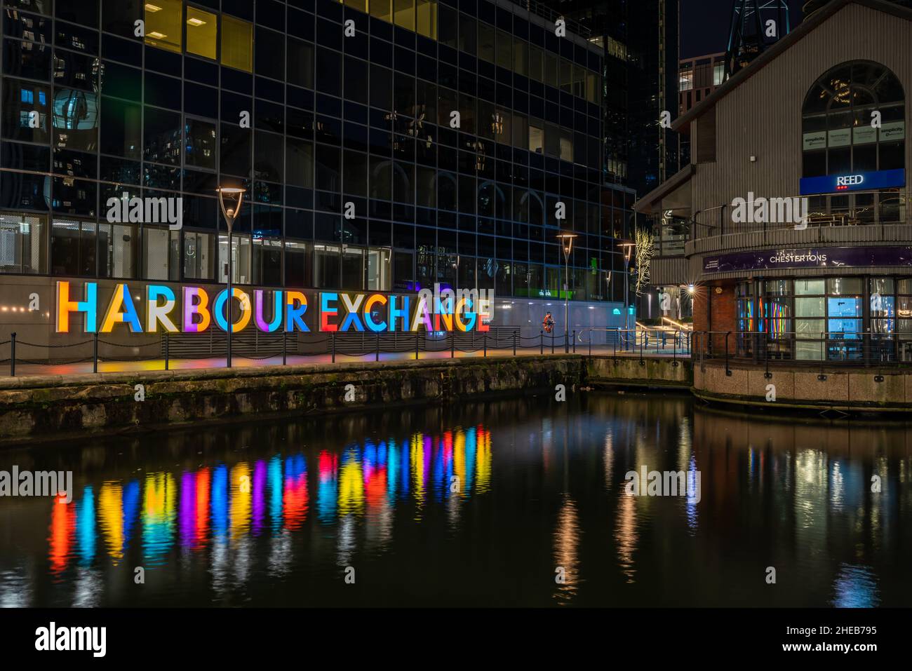 Night view of Harbour Exchange estate seem across Millwall Inner Dock ...