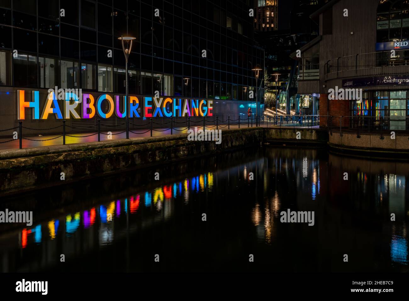 Night view of Harbour Exchange estate seem across Millwall Inner Dock ...