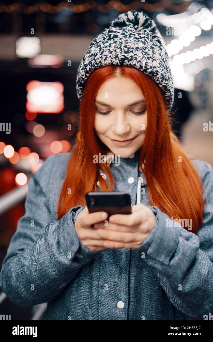 Beautiful Young Woman Using Smartphone Standing on the Night City ...