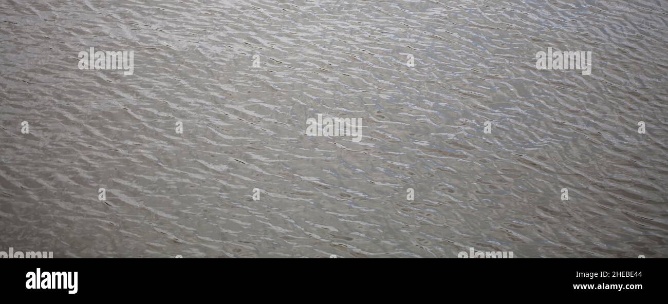 Gray water texture. Water in a river or lake Stock Photo - Alamy