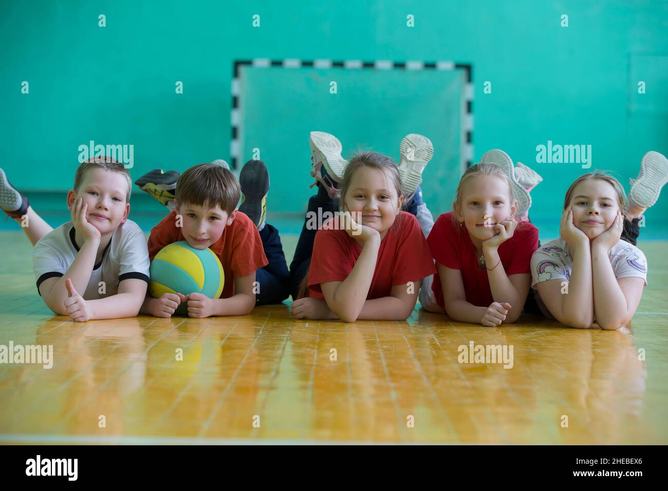 Primary school students at a physical education lesson. A group of chi ...