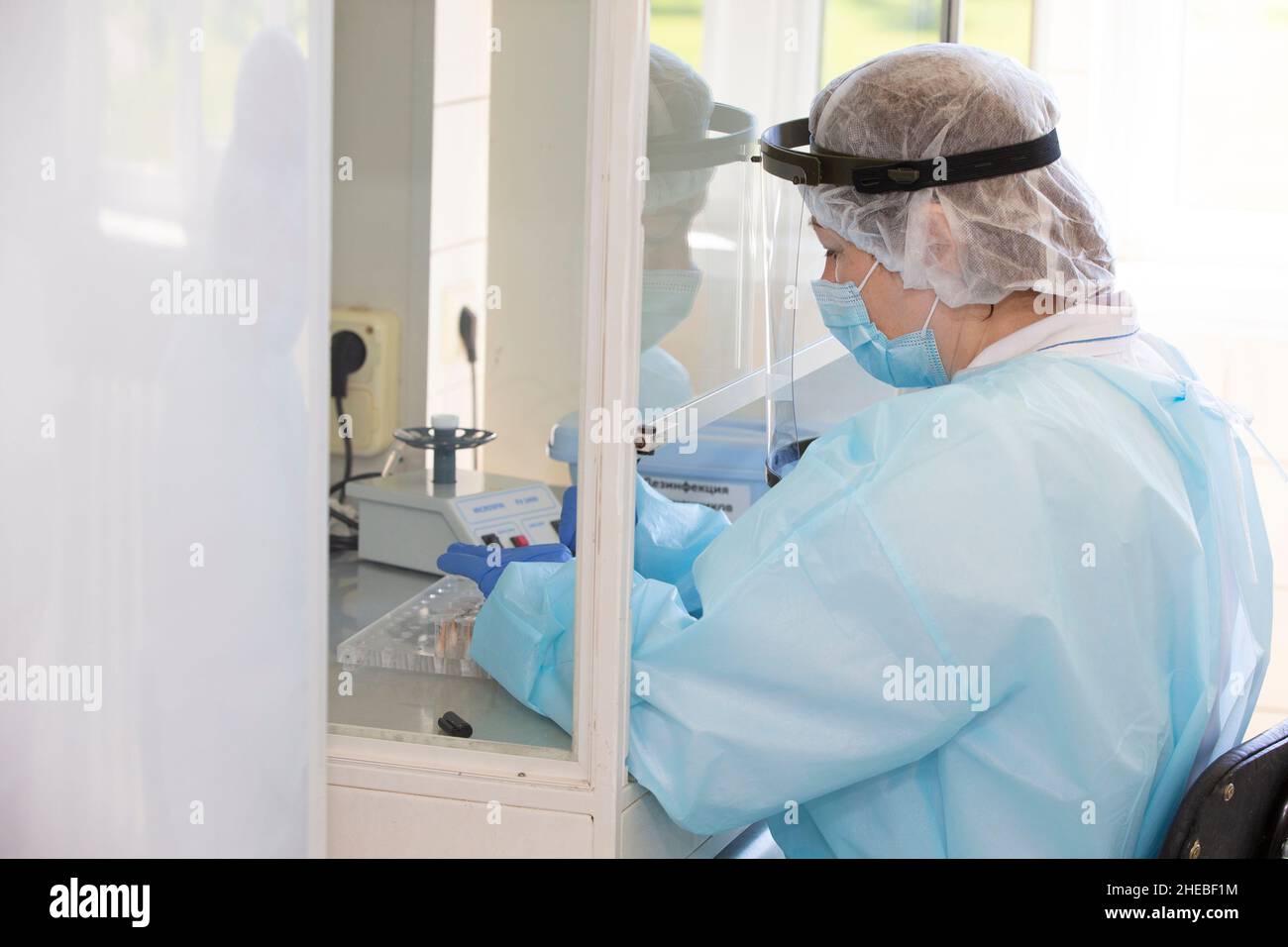 Doctor laboratory assistant in the infectious diseases laboratory ...