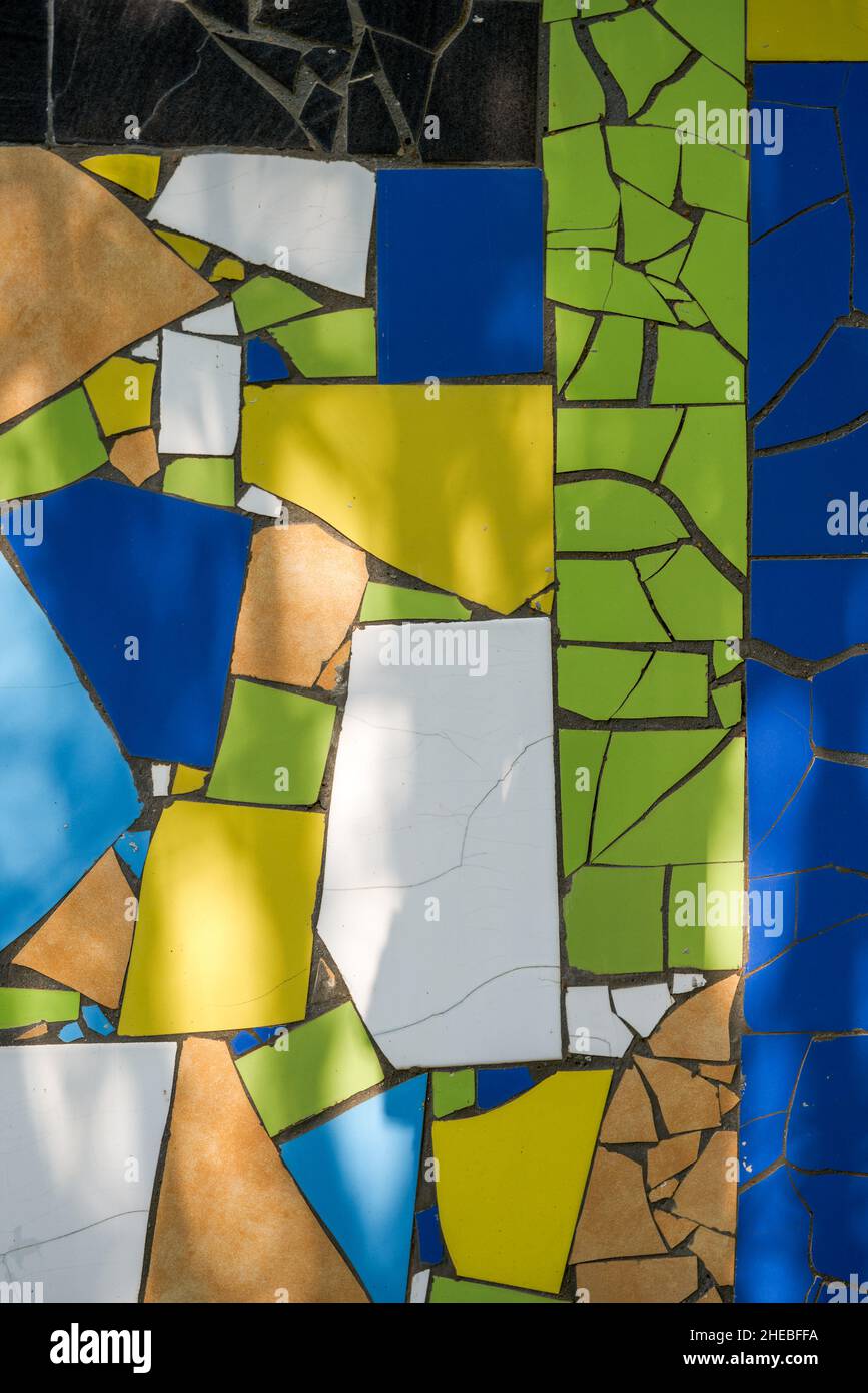 Wall and stone arches decorated with colorful broken tiles Stock Photo ...