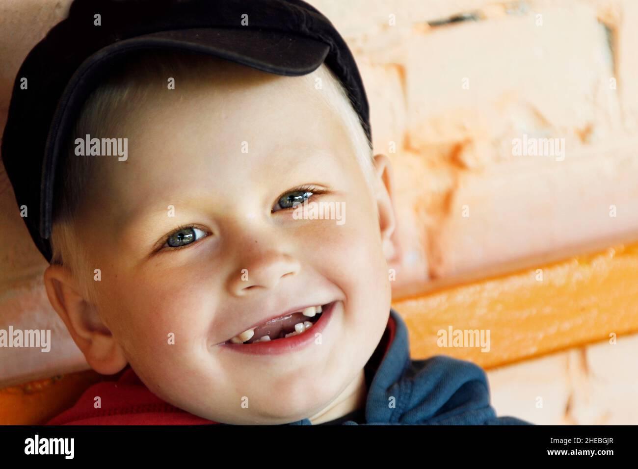 The face of a preschool boy with a toothless smile Stock Photo - Alamy