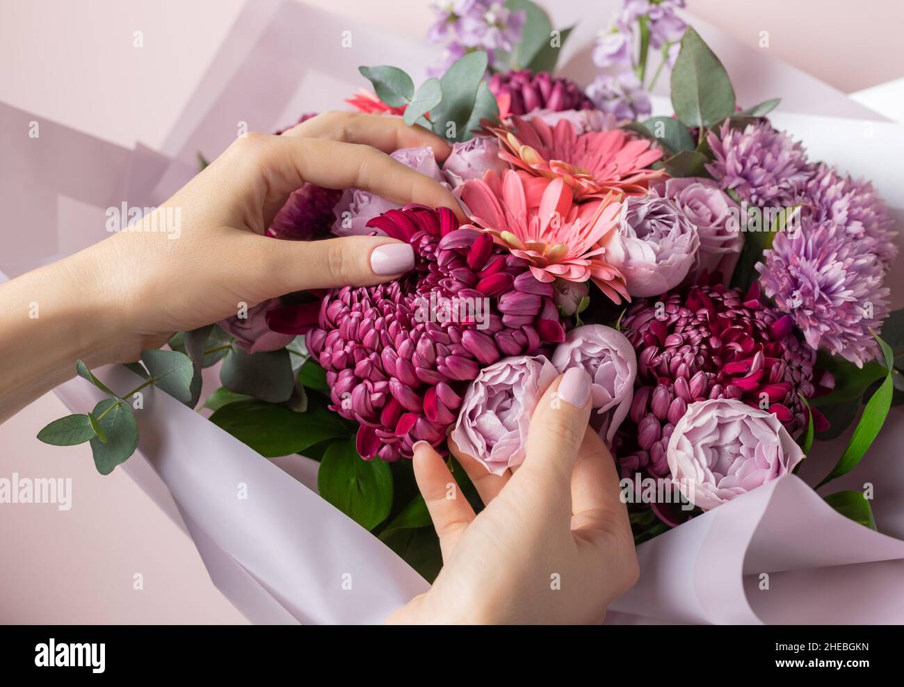 Holding giving bouquet hi-res stock photography and images - Alamy