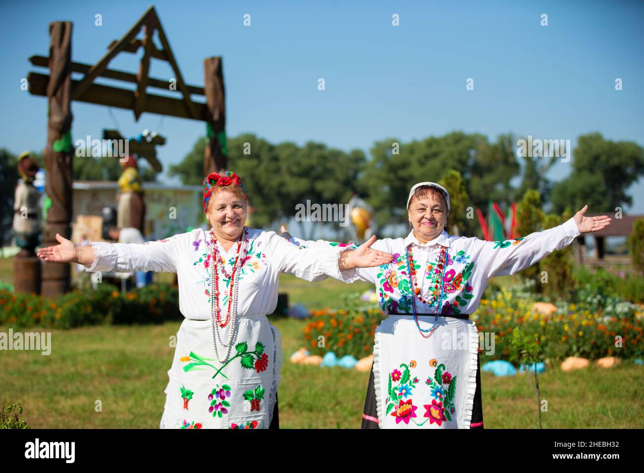 Elderly Belarusian or Ukrainian women in national costume. Hospitable ...
