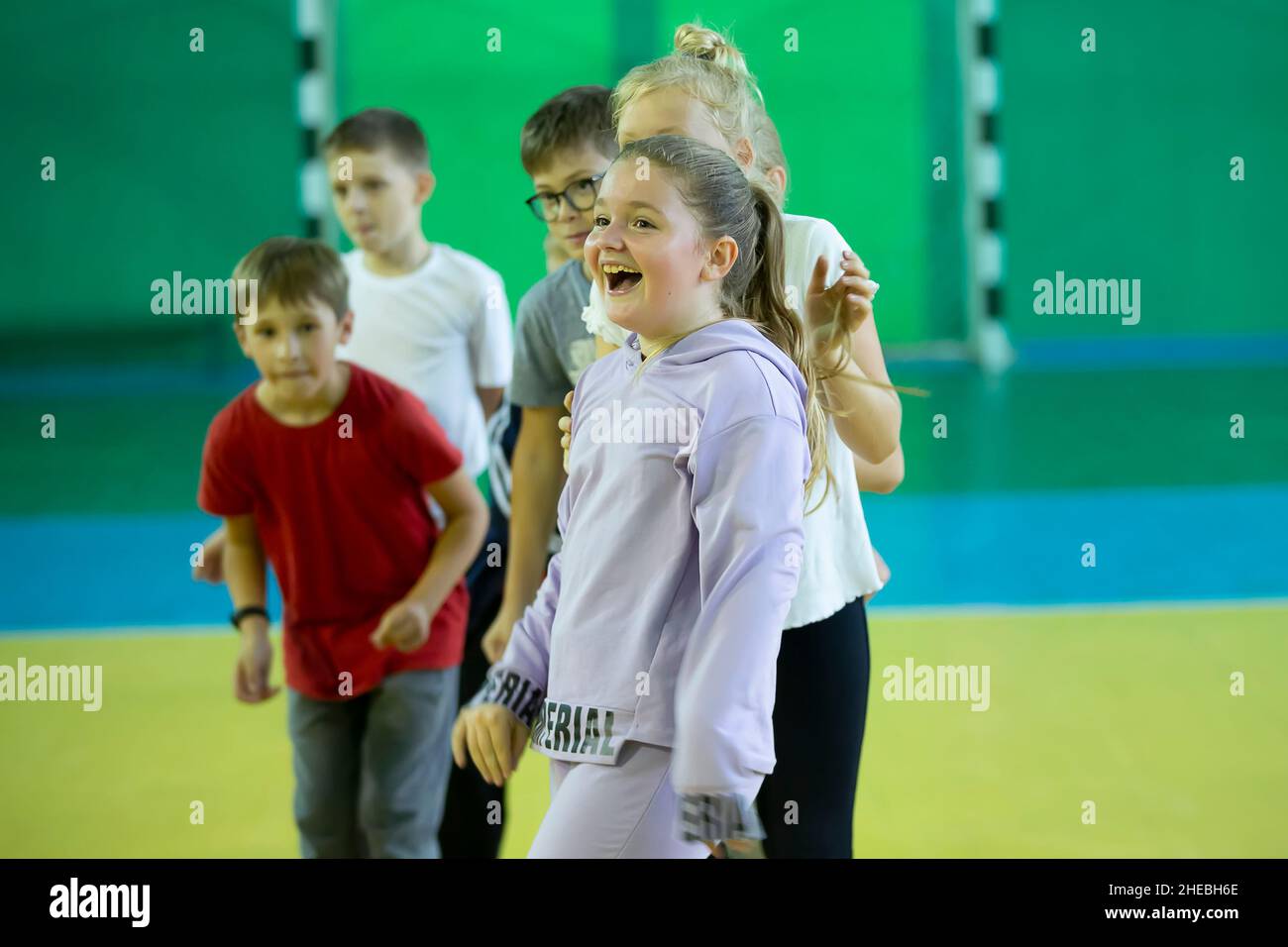 Open physical education lesson. The boy participates in a sports day ...