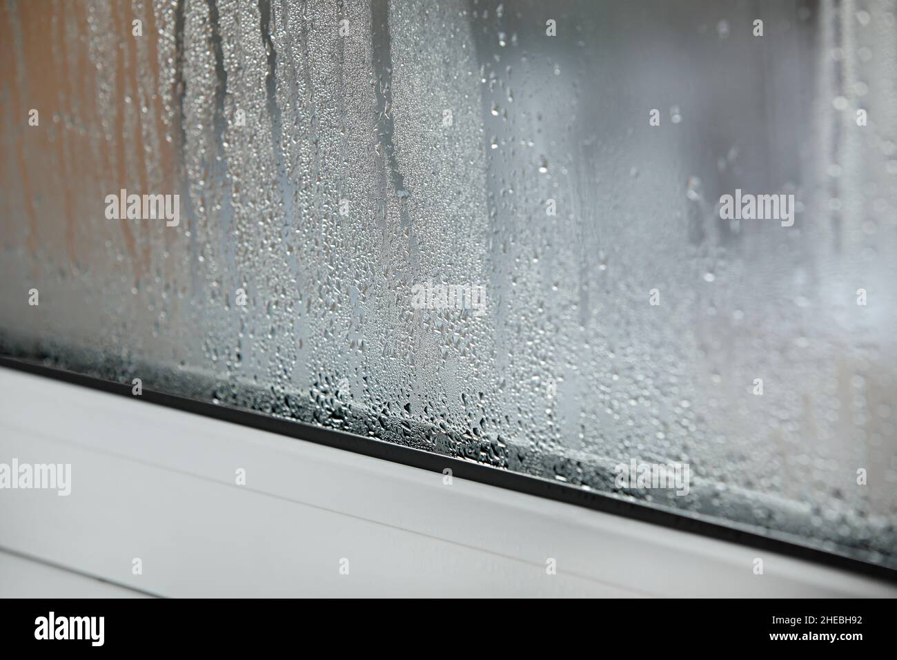 a plastic window with condensation of water on the glass. Double glazed ...