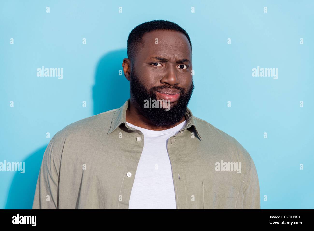 Photo of young african man discontent dissatisfied problem fail face ...