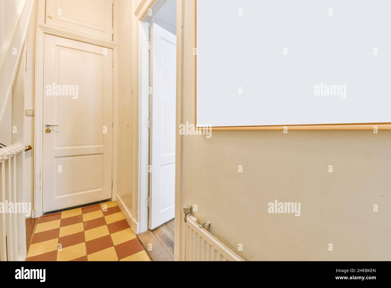 Narrow corridor in daylight with a painting on the wall Stock Photo - Alamy