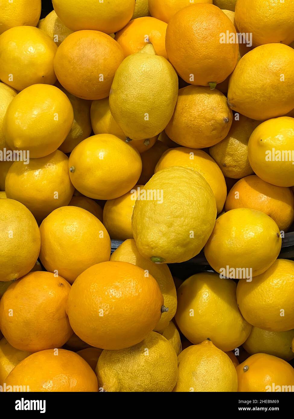 Fresh ripe lemon fruit background Stock Photo - Alamy