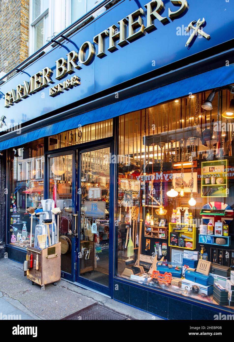 Window frontage of Farmer Bros, a large hardware store in Fulham Rd ...