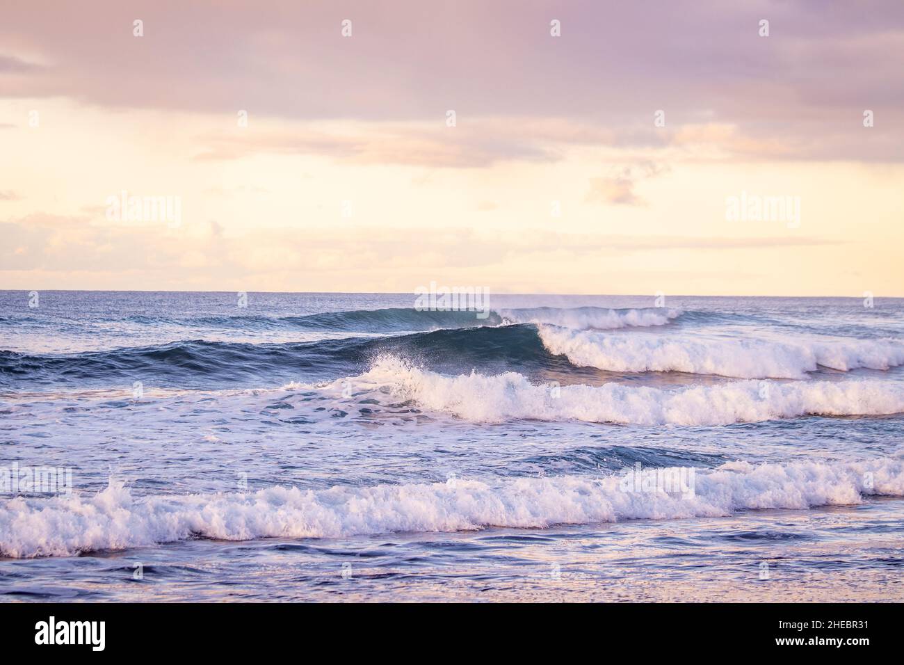 Waves in the Atlantic ocean, before sunset, colorful sky, Azores travel ...