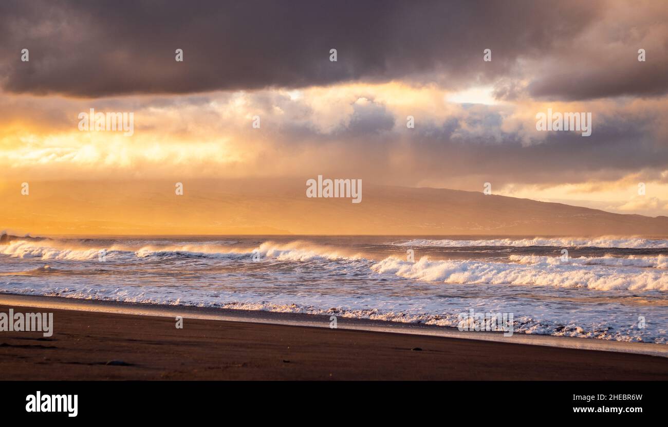 Waves in the Atlantic ocean, before sunset, colorful sky, Azores travel ...