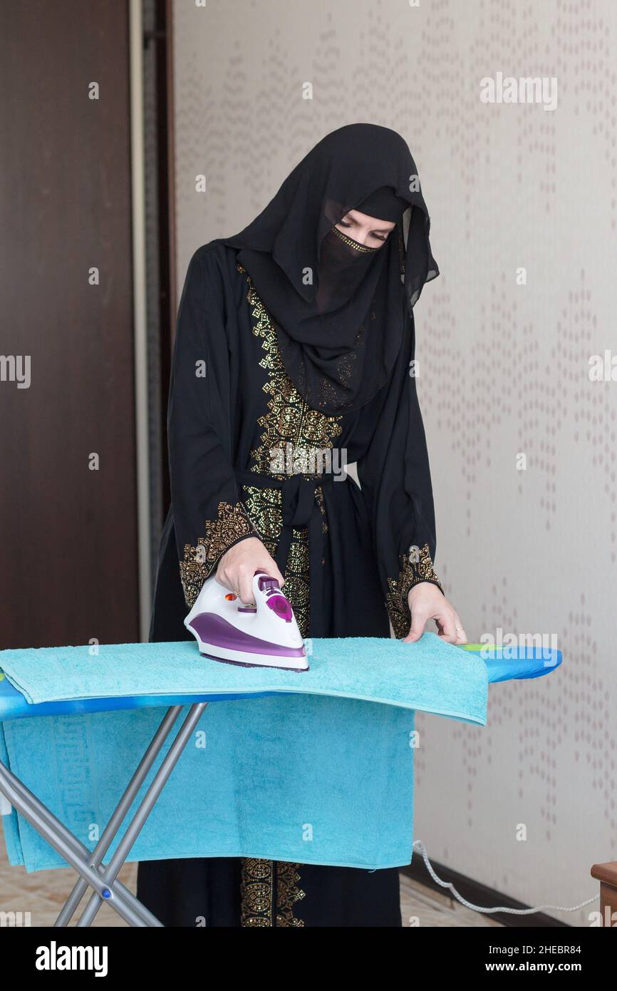 Household duties of a Muslim woman Middle East Stock Photo - Alamy