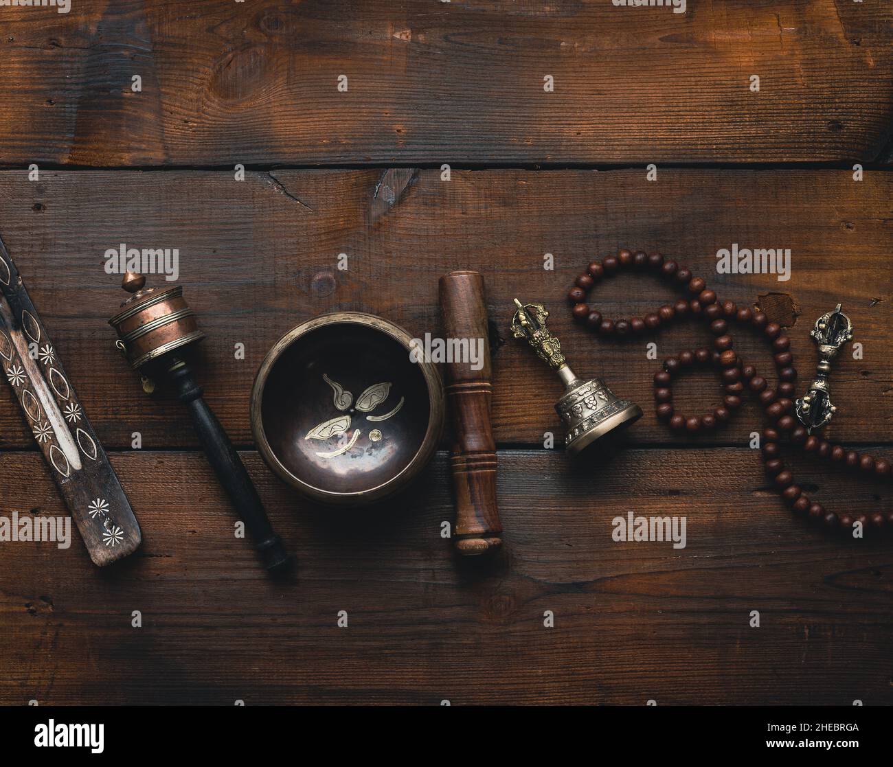 Tibetan singing copper bowl with a wooden clapper , objects for ...