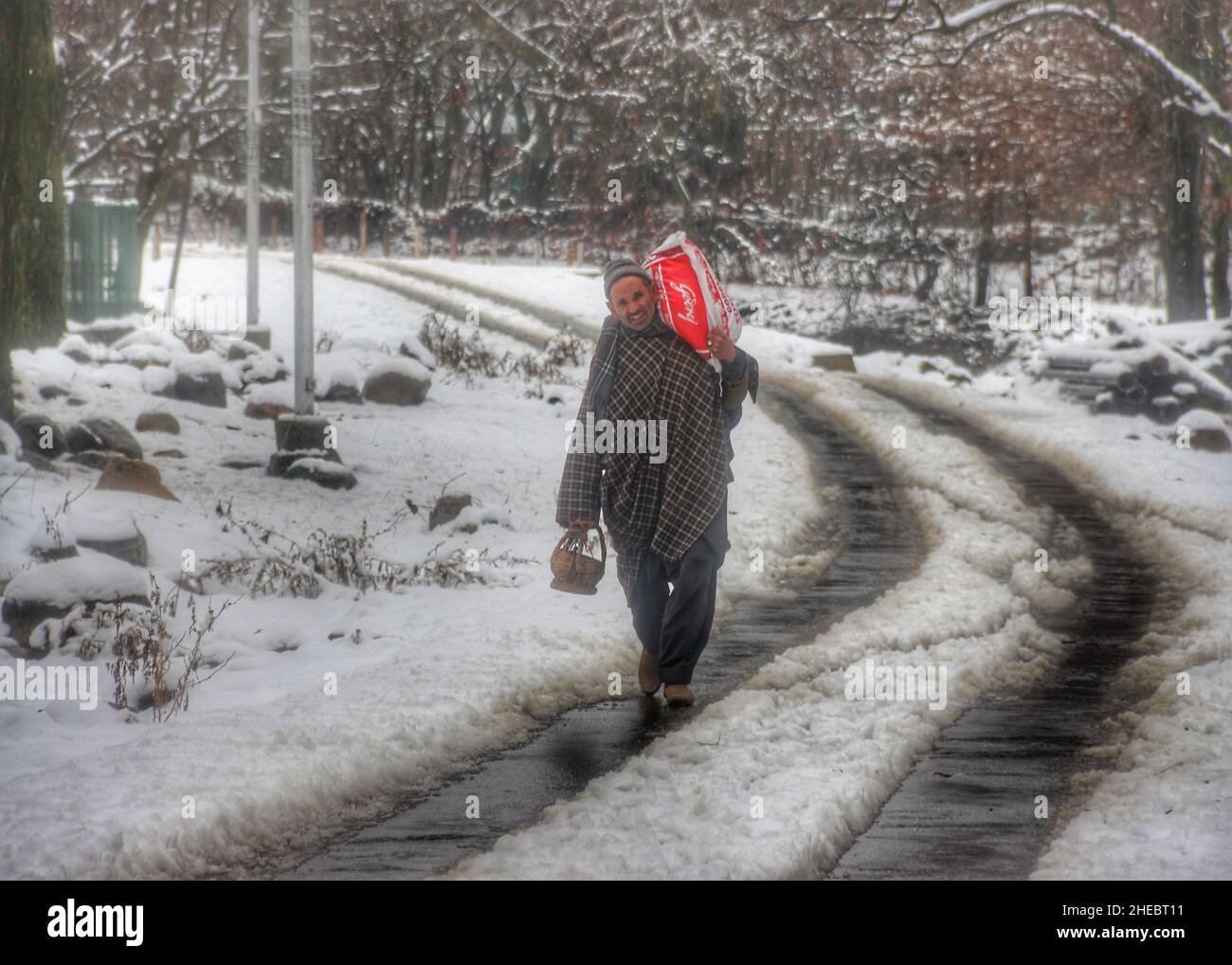 Man carrying a rice bag hi-res stock photography and images - Alamy