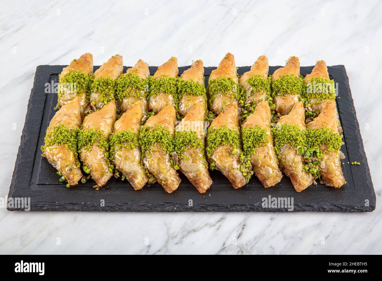 Sobiyet baklava on a marble background. Turkish patisserie dessert with ...
