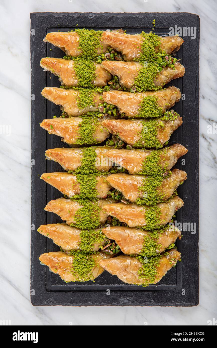 Sobiyet baklava on a marble background. Turkish patisserie dessert with ...
